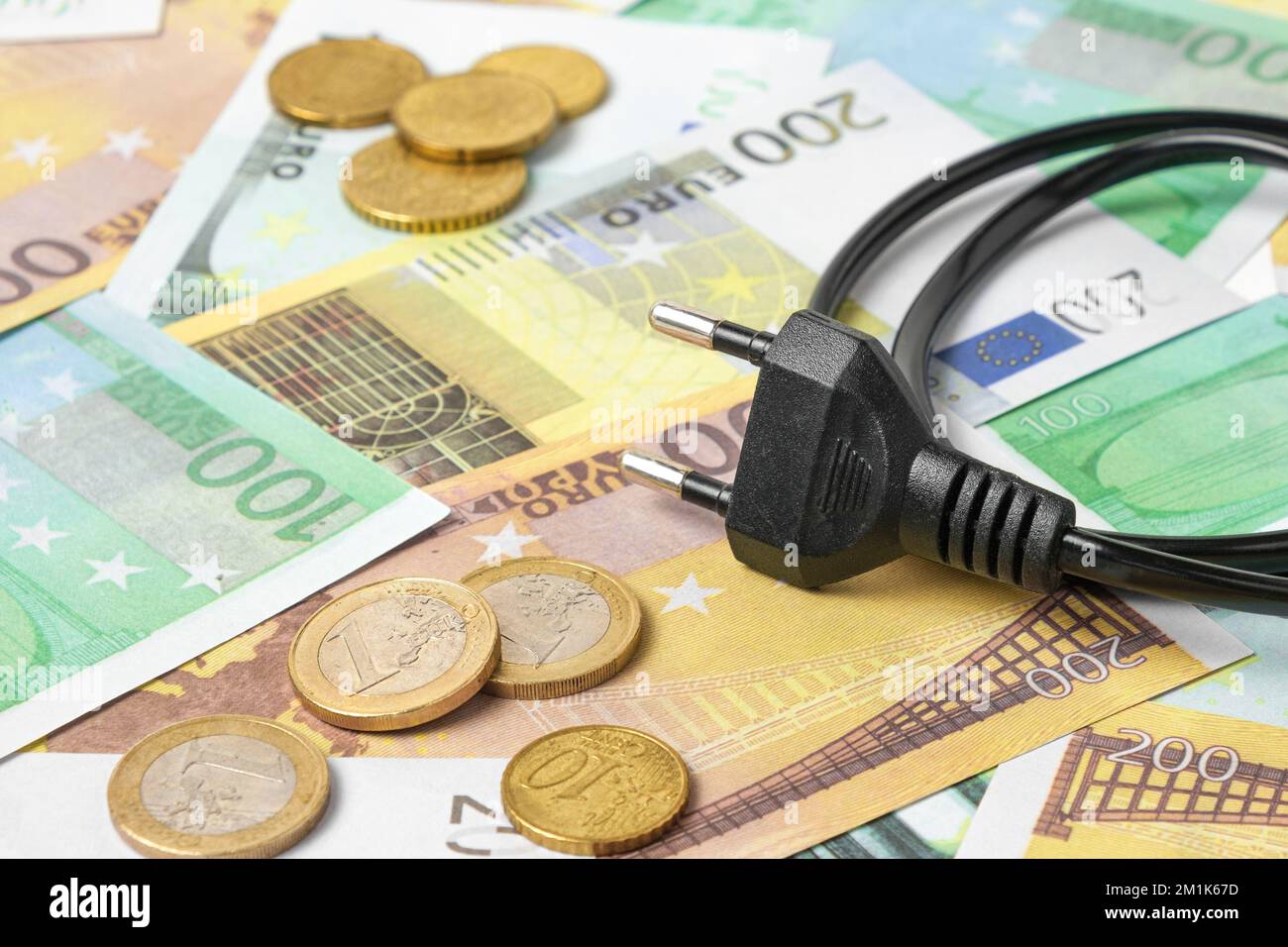 Power plug on Euro Banknotes Background. Increasing Consumption. Cost ...