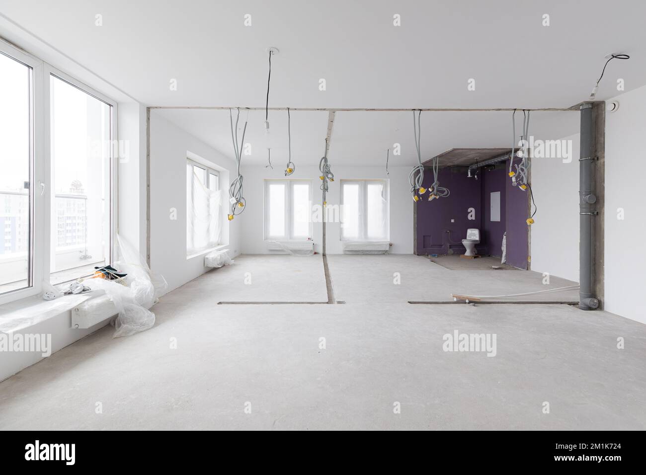 Empty concrete commercial space without finishing with partitions Stock ...