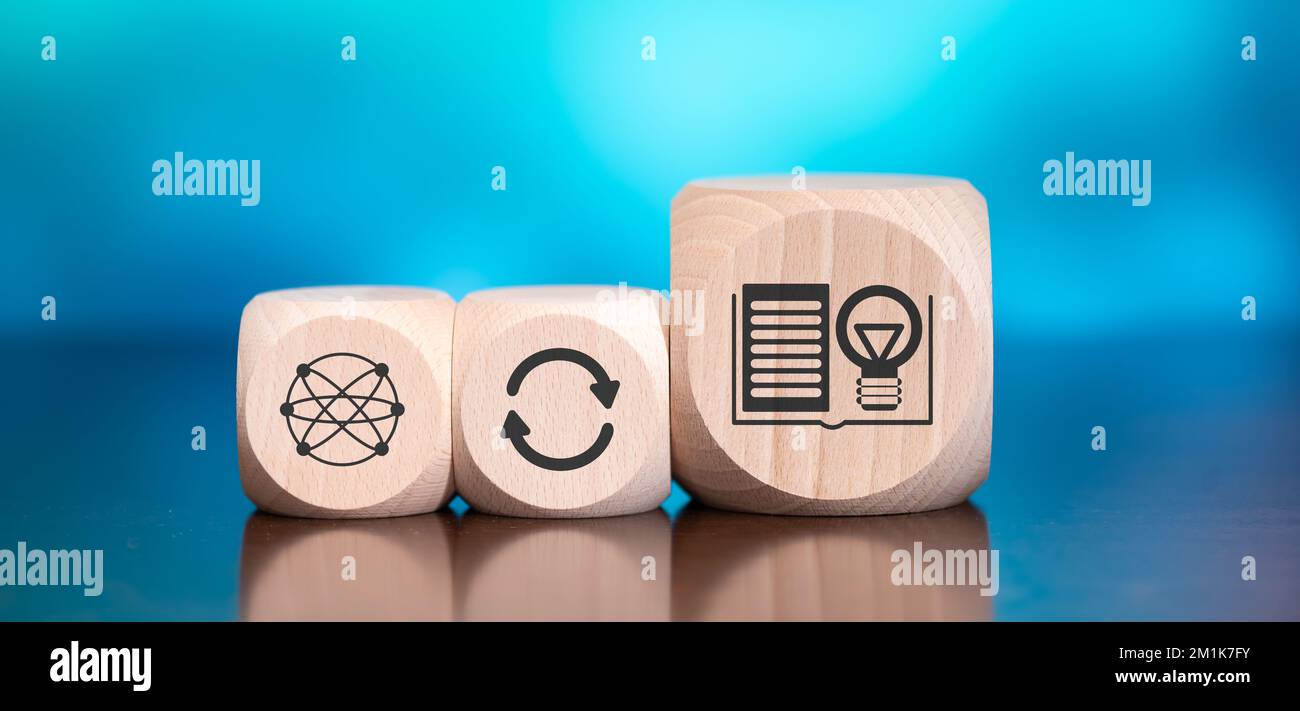 Wooden blocks with symbol of knowledge concept on blue background Stock ...