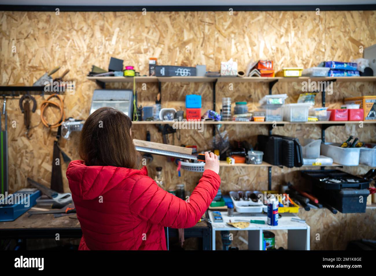 female builder in her home workshop in america making Stock Photo - Alamy