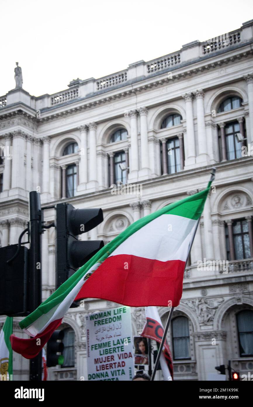 Iranian Shir-o-Khorshid (Lion and Sun) flag, flying in front of Number ...