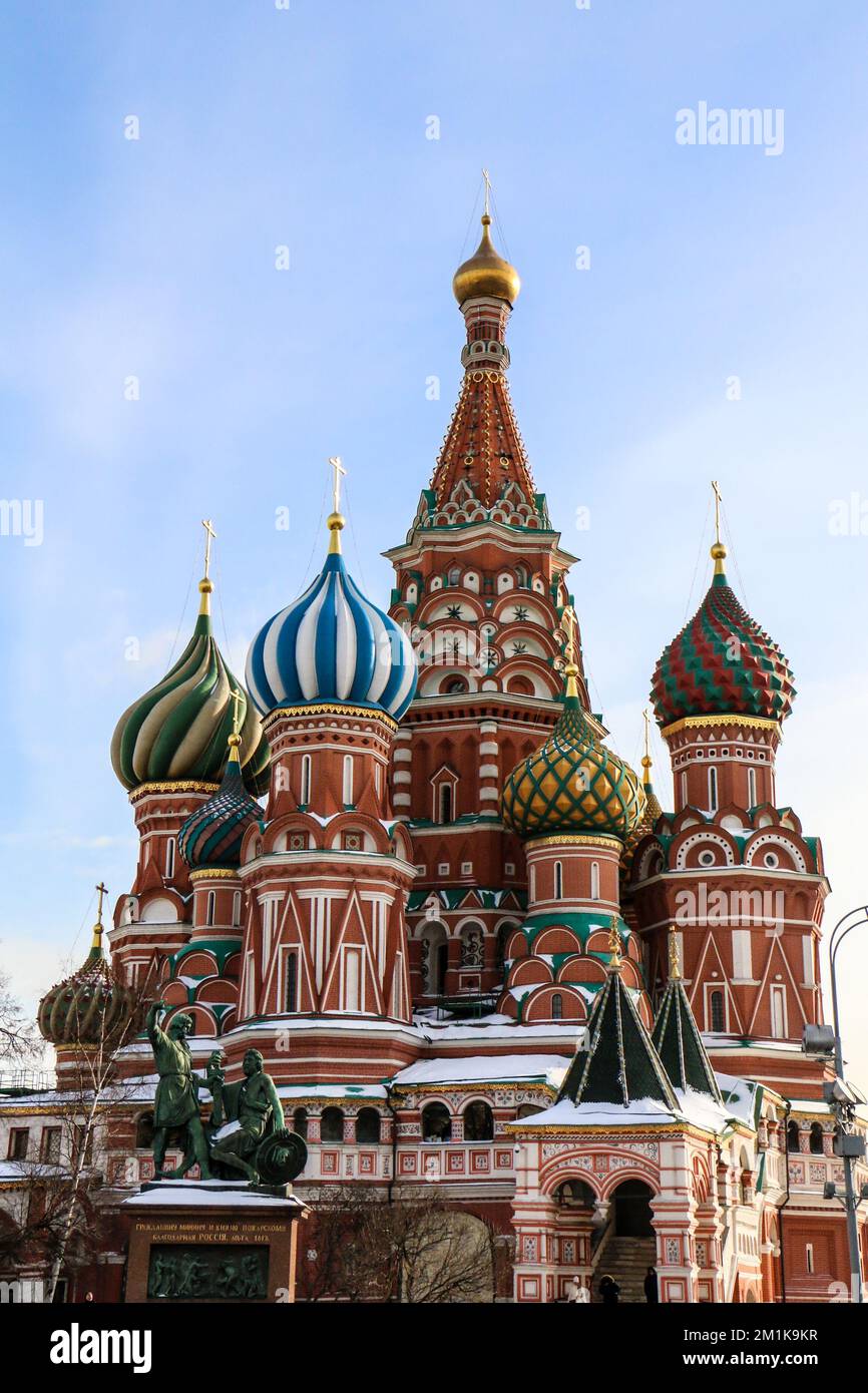 A vertical shot of St. Basil's Cathedral on blue sky background in ...