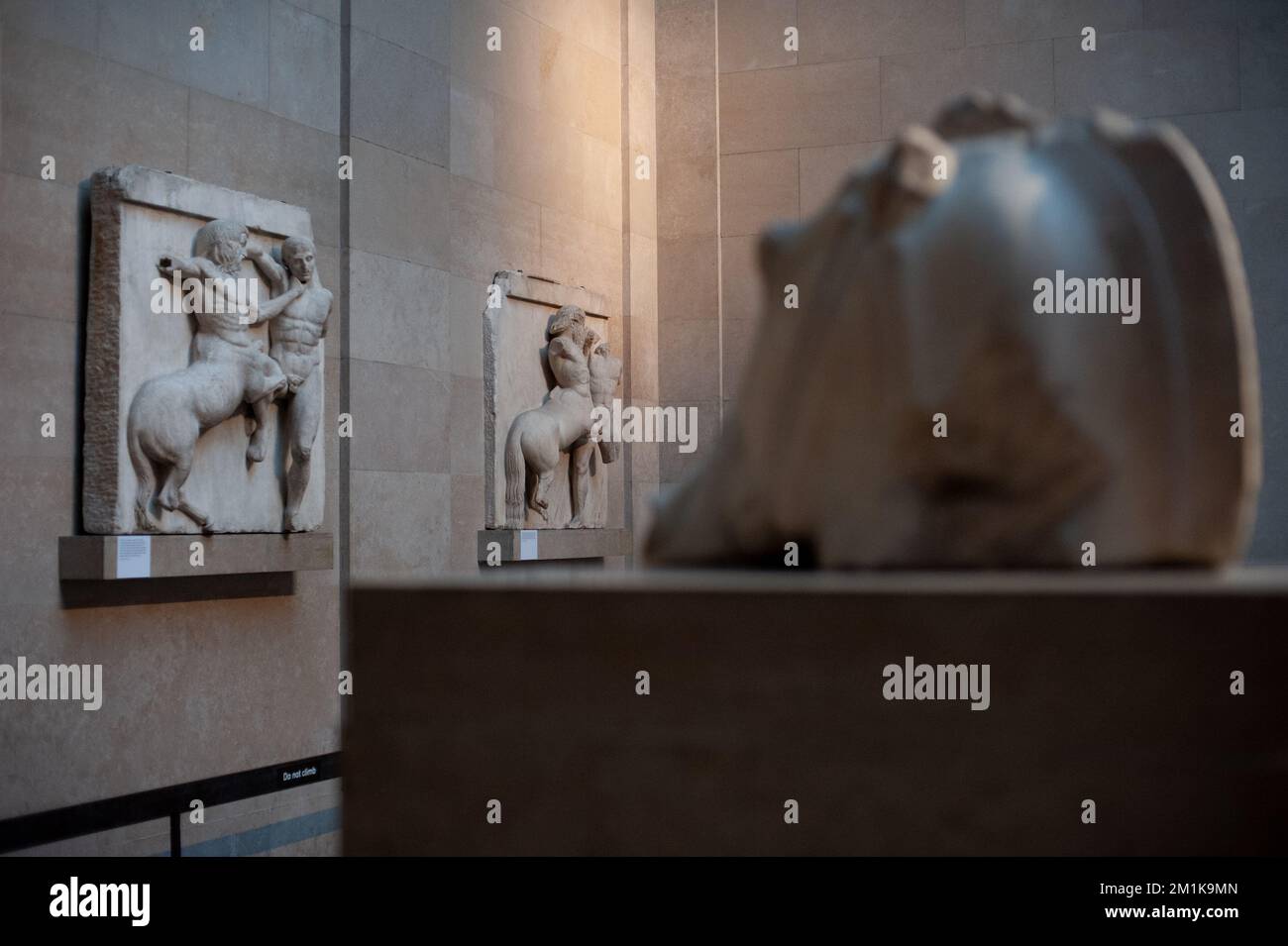 London, UK. 12th Dec, 2022. Two of the metopes in the Parthenon gallery ...