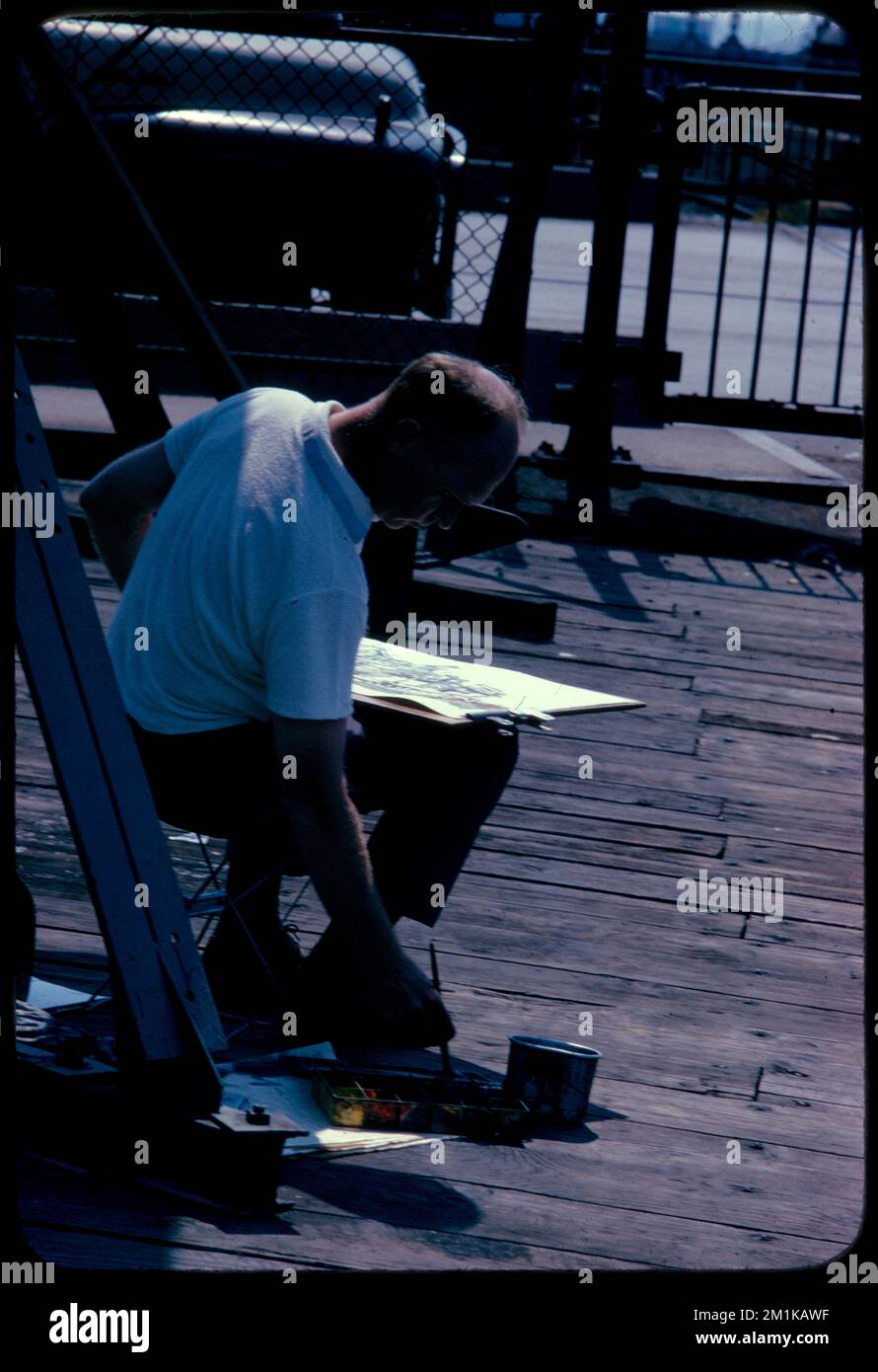 Artist reaching for paint on pier , Painting. Edmund L. Mitchell ...