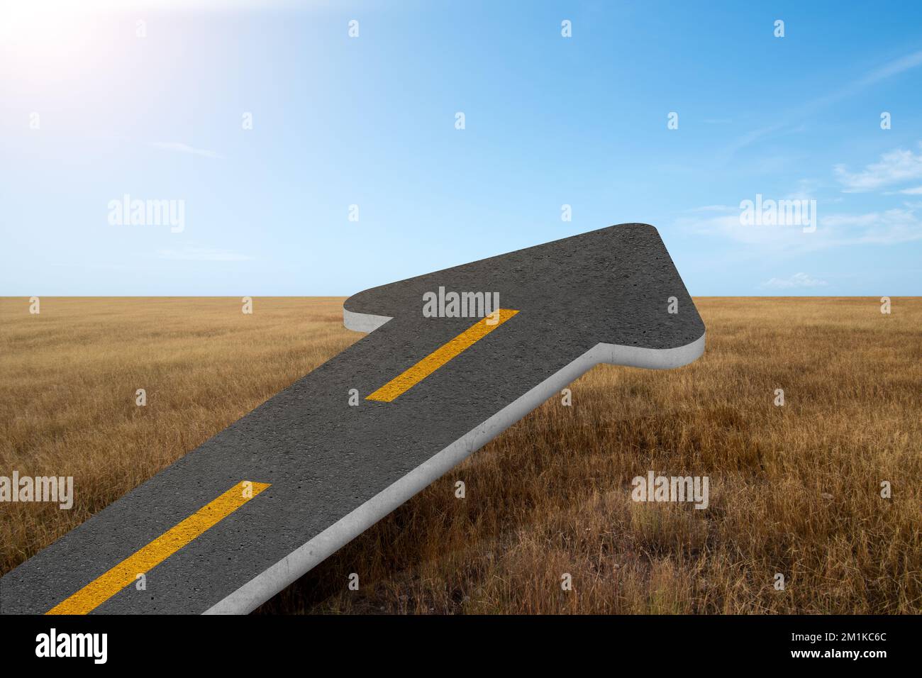 Asphalt road arrow with meadow and blue sky background Stock Photo - Alamy