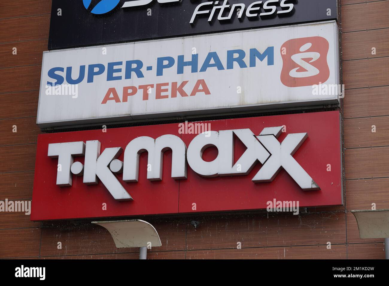 A closeup shot of Super Pharm and TK Maxx logos on the Galeria Malta ...