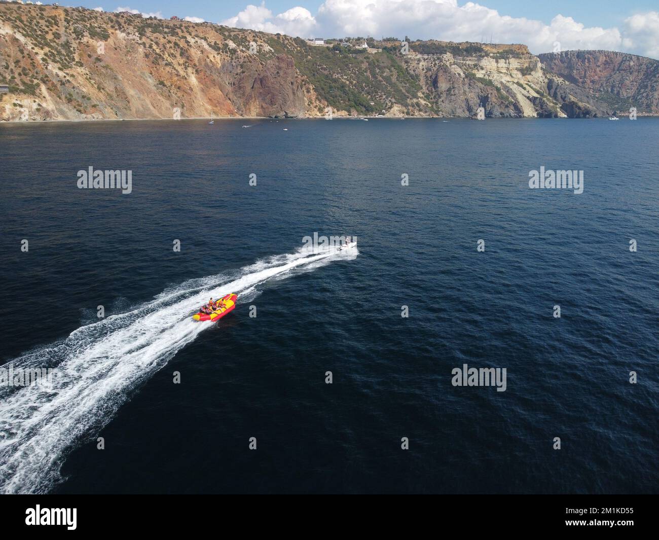 Girl on inflatable boat hi-res stock photography and images - Alamy