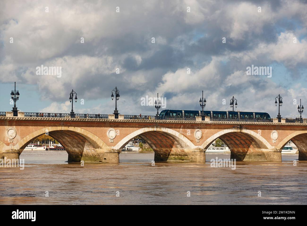Garonne river and Pont de Pierre bridge. Tramway, Bordeaux,France Stock ...