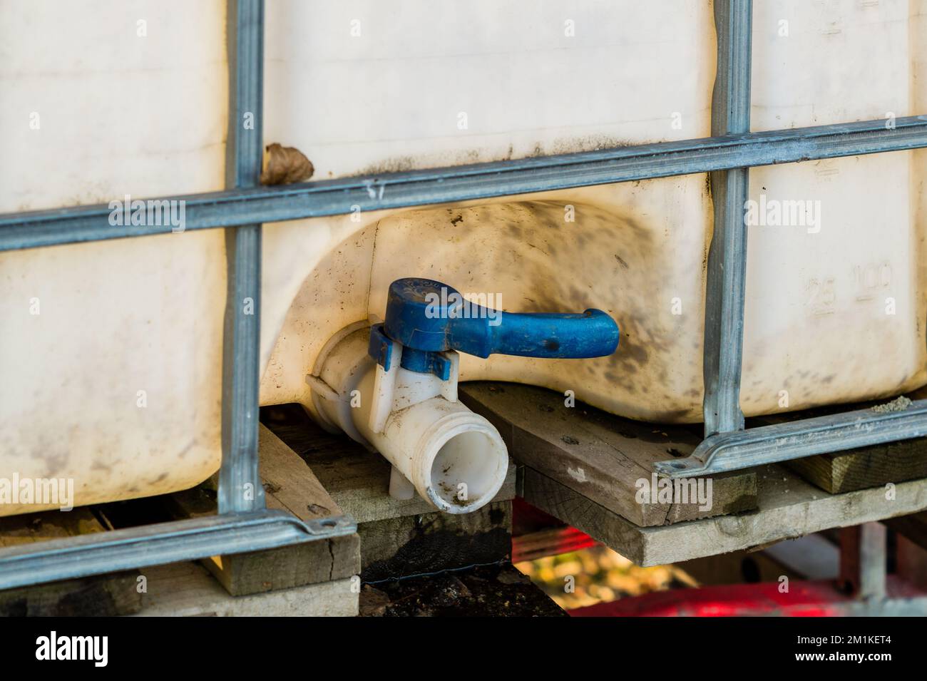 Faucet of a PVC barrel Stock Photo - Alamy