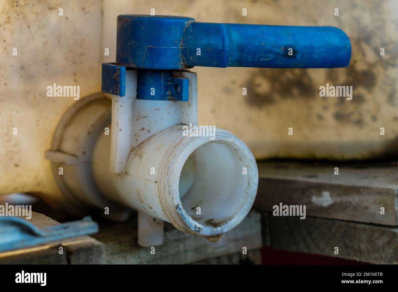 Faucet of a PVC barrel Stock Photo - Alamy