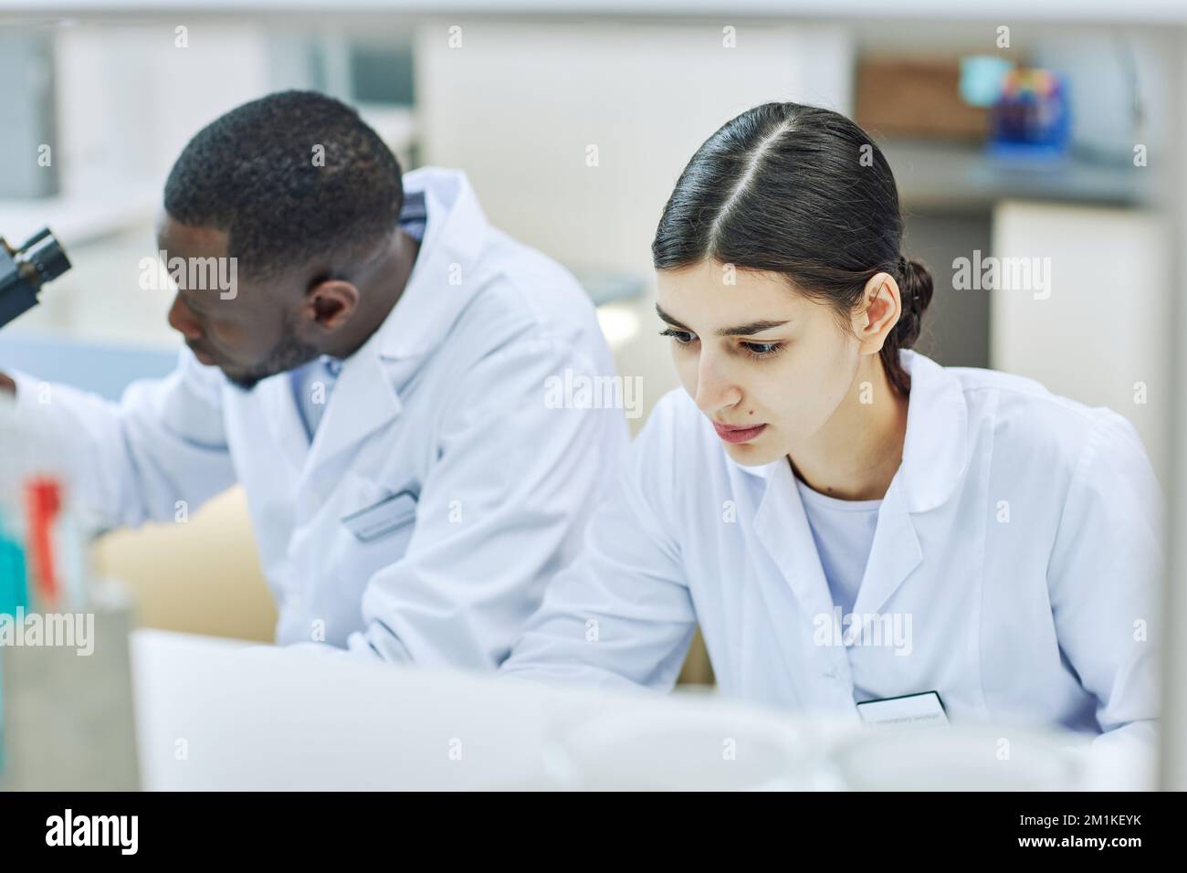 Male female workers doing hi-res stock photography and images - Alamy