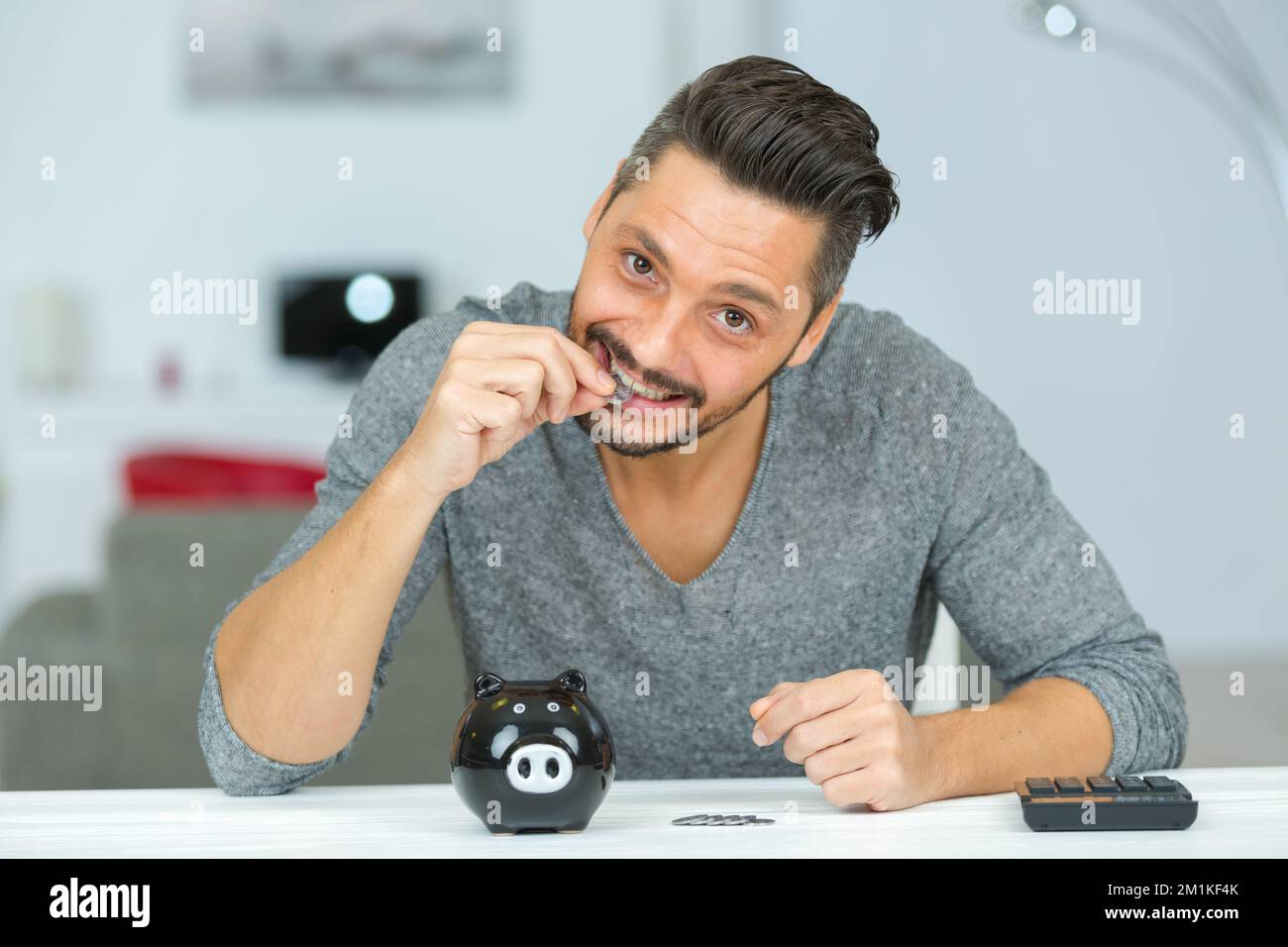 Biting gold coin hi-res stock photography and images - Alamy