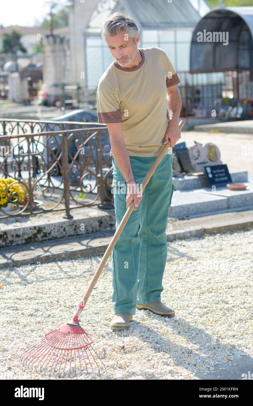 Raking stones hi-res stock photography and images - Alamy