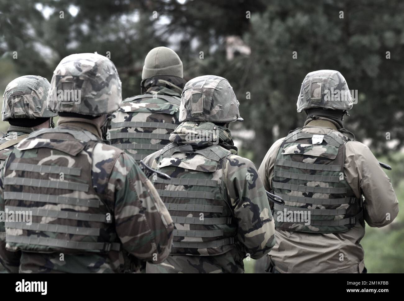 Soldiers with assault rifles from the back. Military. War Stock Photo ...