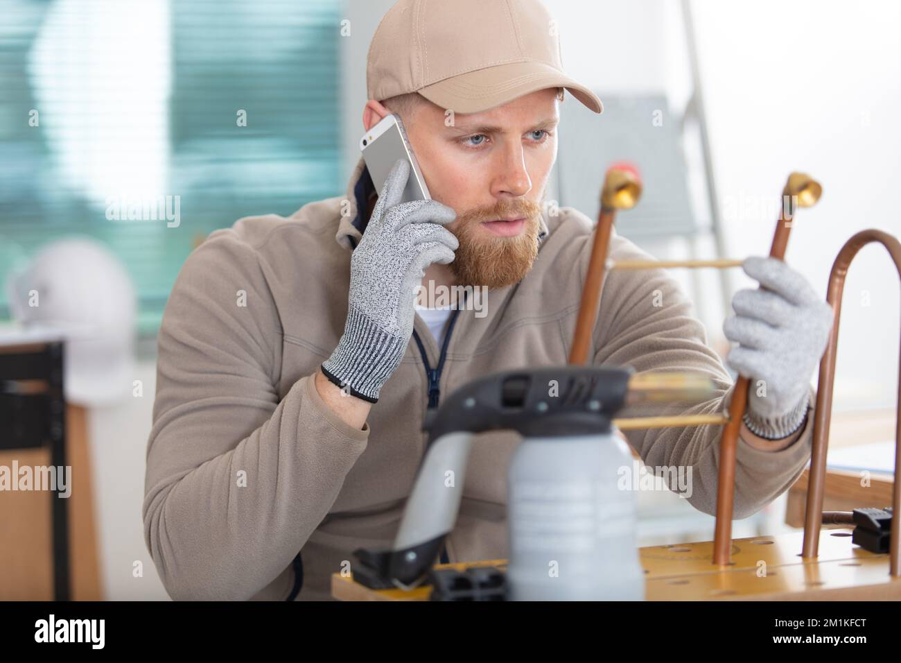Construction worker carrying pipes hi-res stock photography and images ...