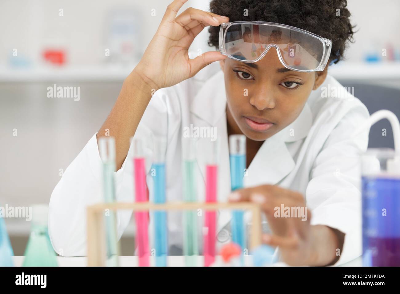 serious female lab worker Stock Photo - Alamy