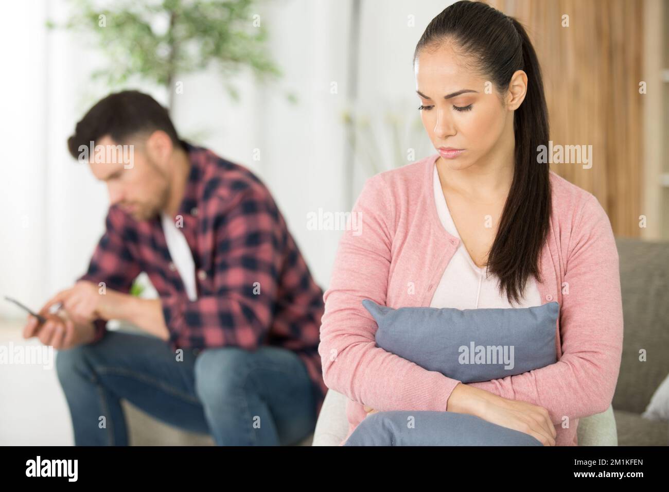 sad disappointed wife not talking ignoring husband Stock Photo - Alamy