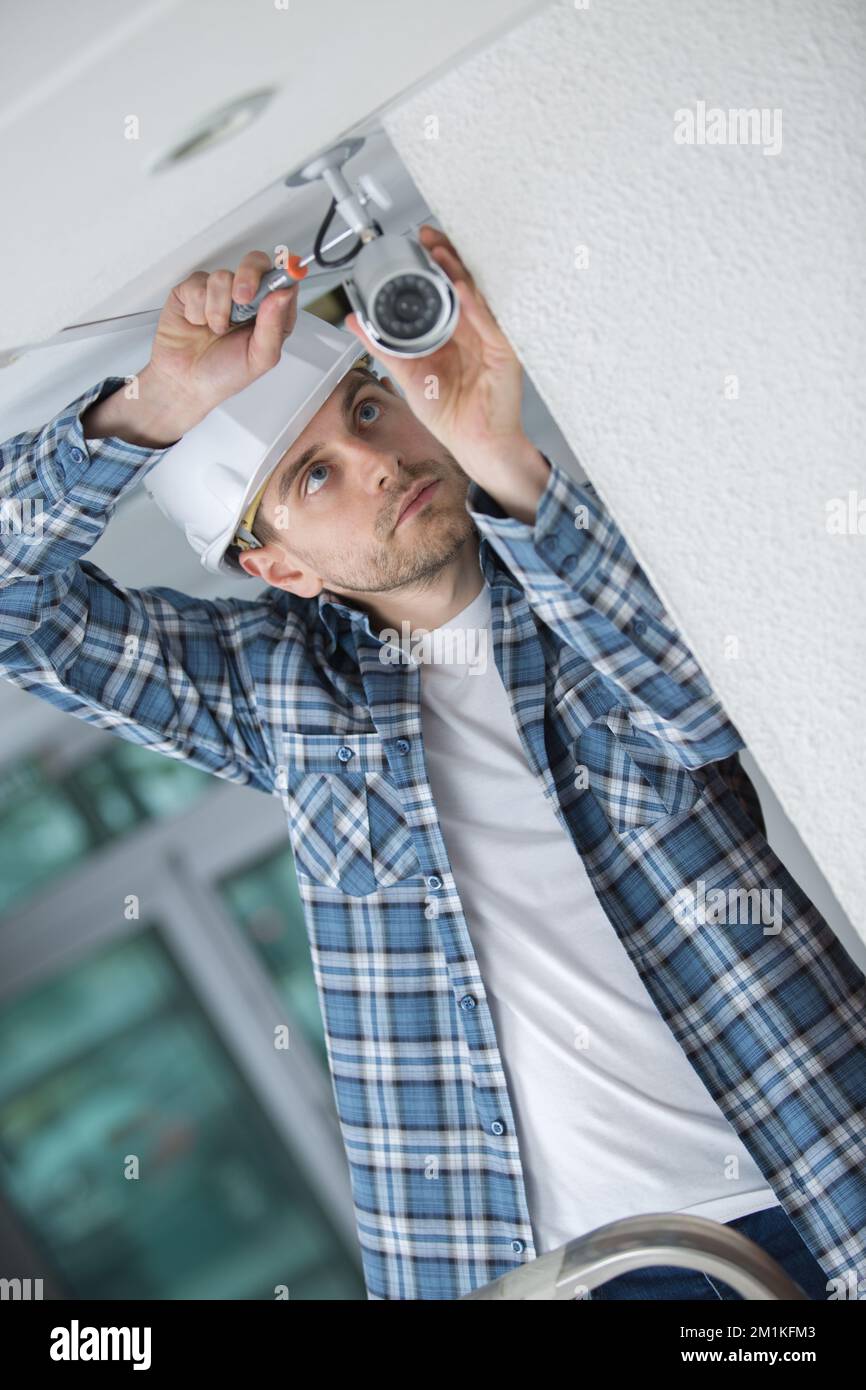 Cctv Professional Connecting The Device Stock Photo Alamy