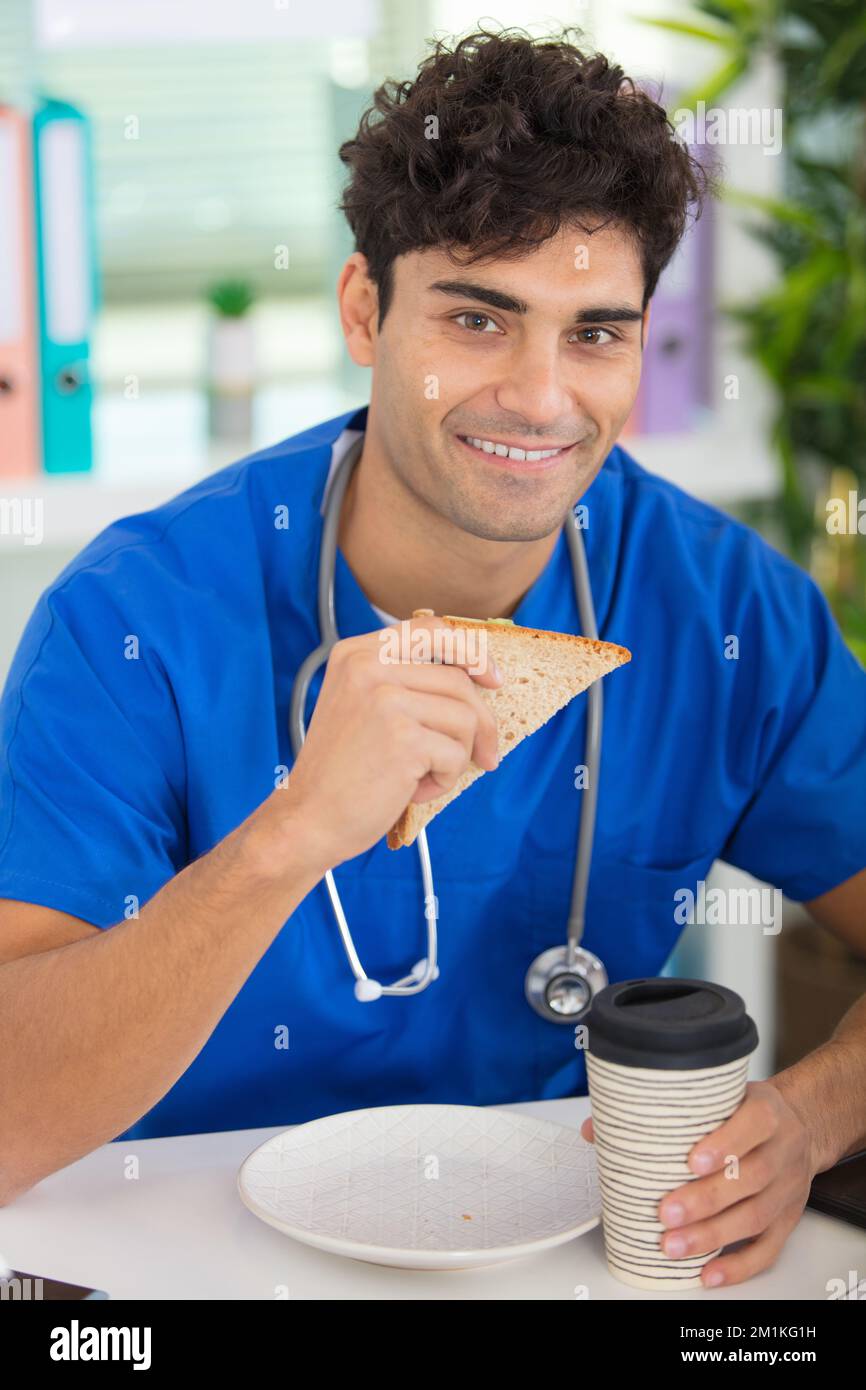 Doctor eating break hi-res stock photography and images - Alamy