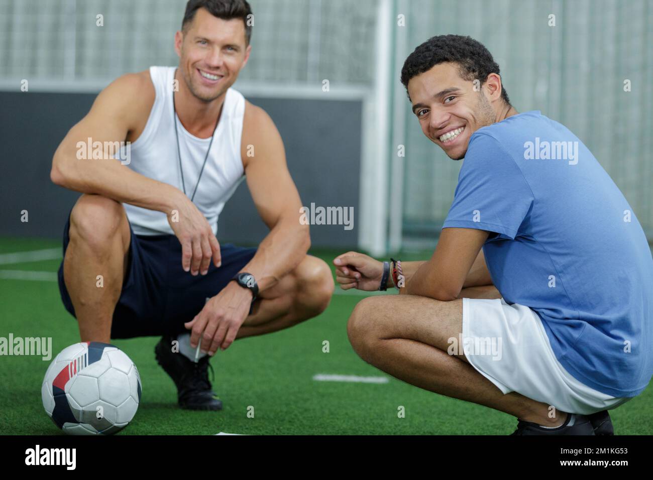 Soccer coach young player hi-res stock photography and images - Alamy