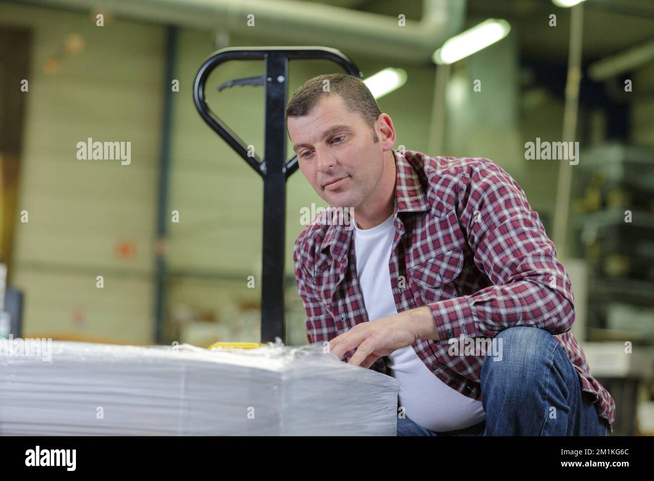 forklift driver work in a warehouse Stock Photo - Alamy