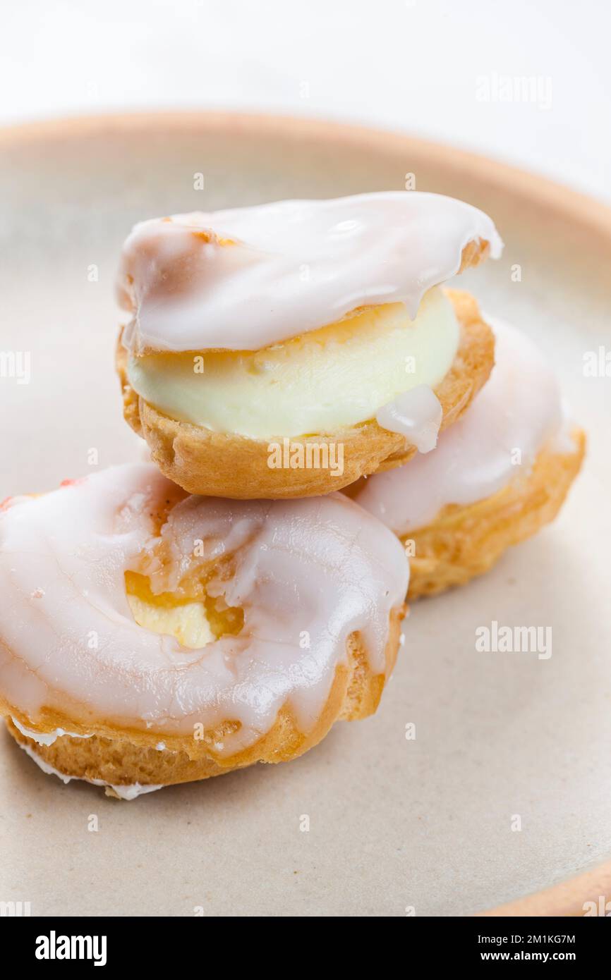 Three cream puffs hi-res stock photography and images - Alamy