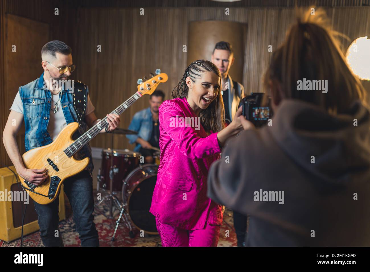 Male photographer recording video woman hi-res stock photography and ...