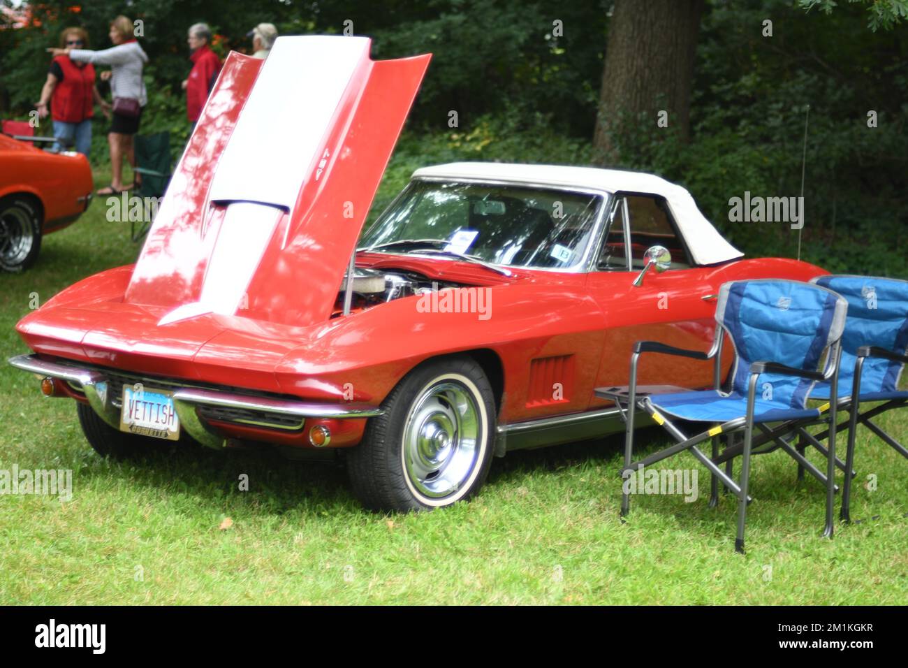 A red vintage Chevrolet Corvette on display at the Hampshire Illinois ...