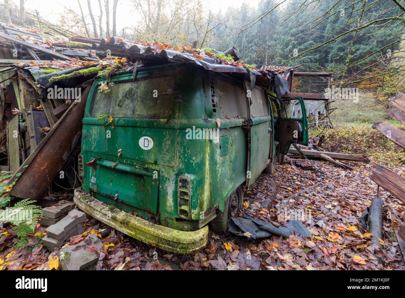 An old abandoned classic vintage green bus outdoors Stock Photo - Alamy