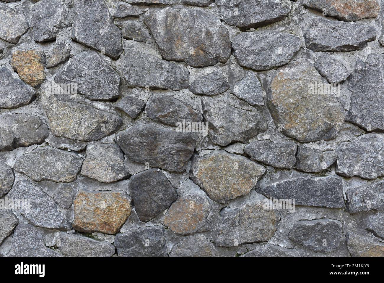 Old natural stone wall textured background Stock Photo - Alamy