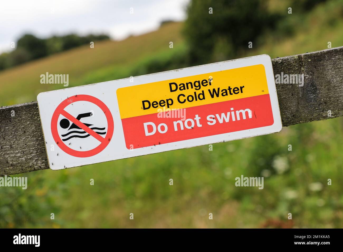 A warning sign saying 'Danger Deep Cold Water', 'Do Not Swim', England ...