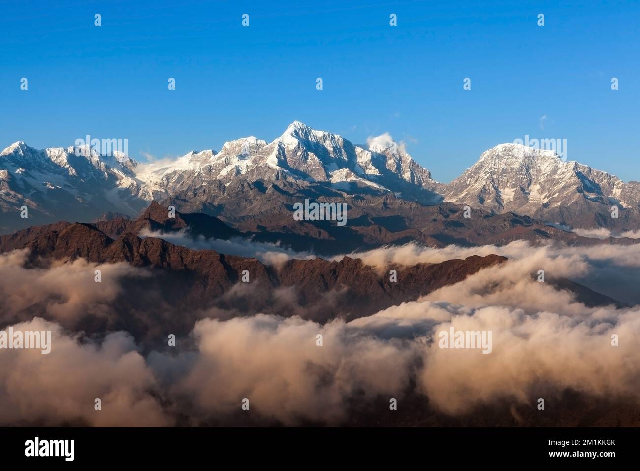 Mountain sunrise landscape in Himalayas, Nepal. Clouds floating above ...