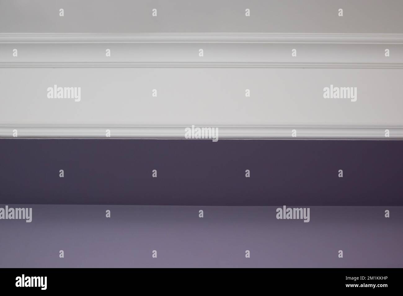 Ceiling moldings in the interior, details of an even edge of the ...