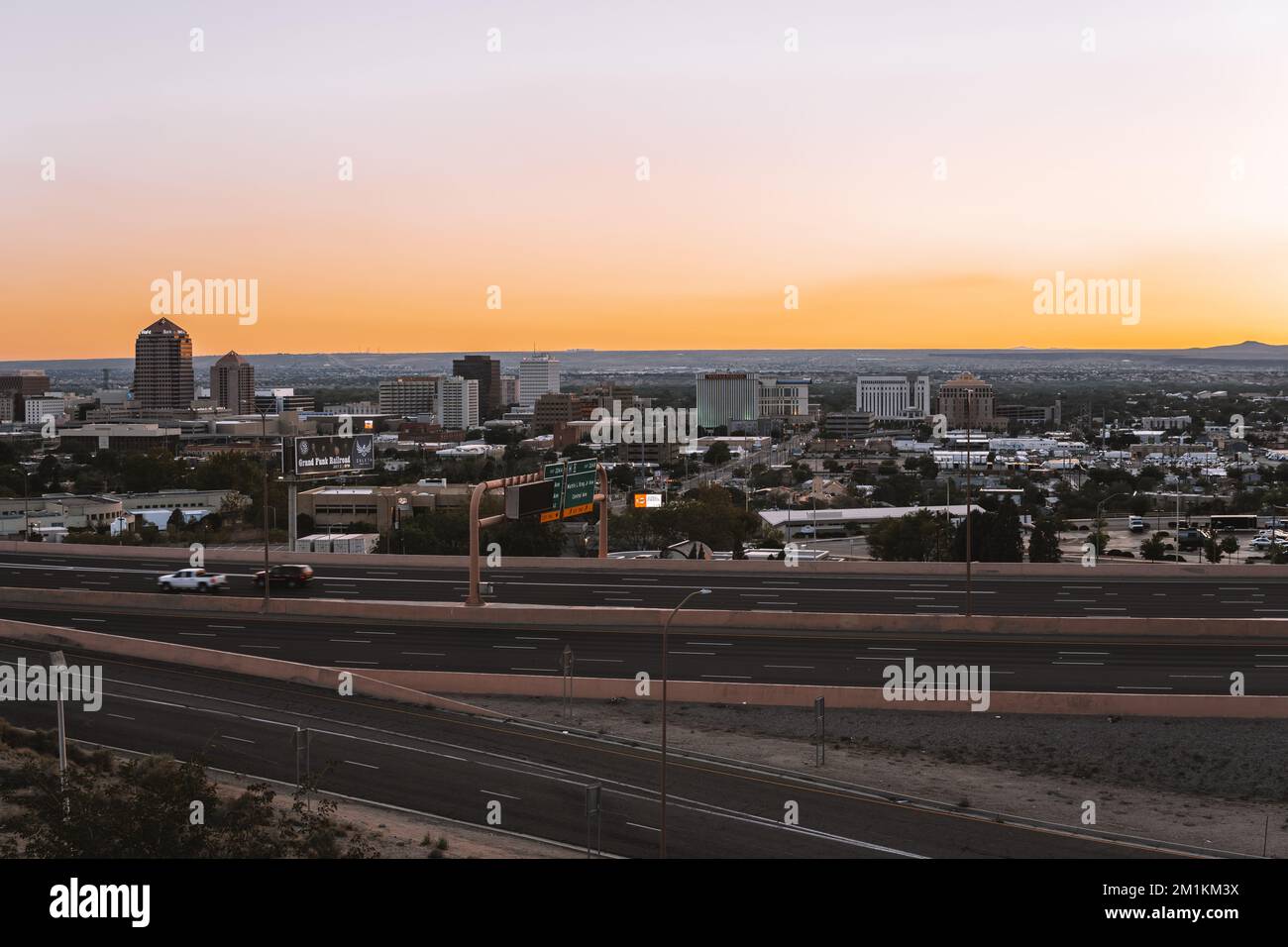 A sunset view of I25 highway in Midtown Albuquerque skyline Stock Photo ...