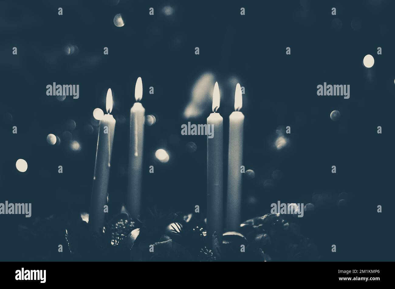 burning candles on advent wreaths with christmas tree background Stock ...