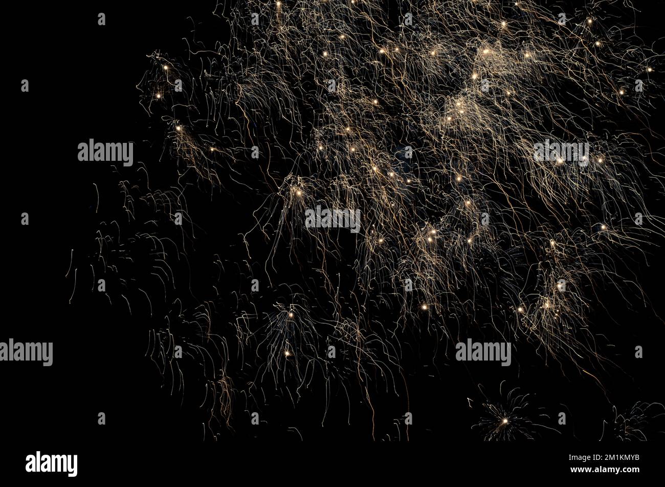 golden red glittering fireworks, black background, isolated Stock Photo ...