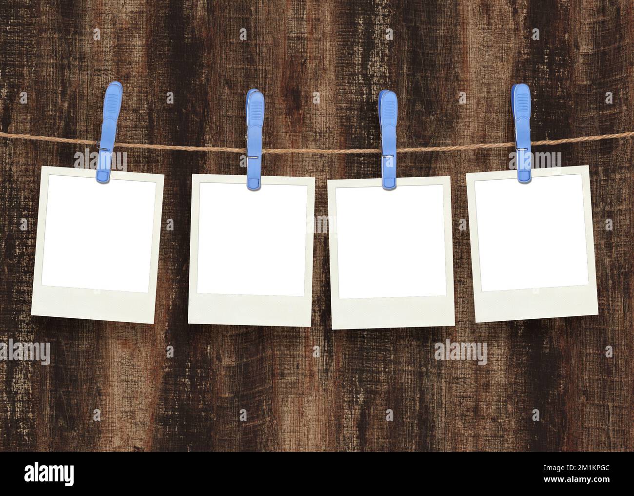Four plastic clothespins instant frame hi-res stock photography and ...