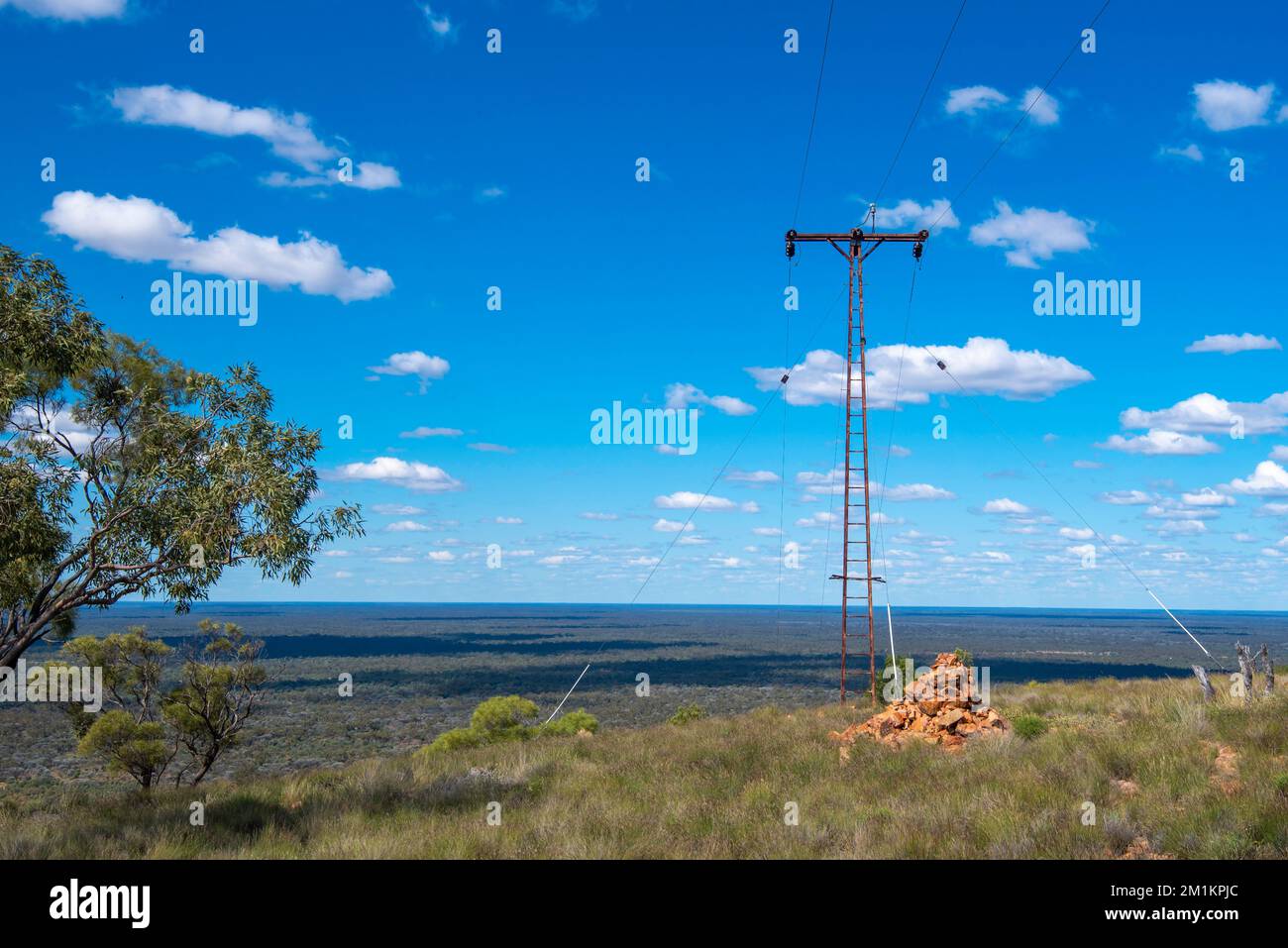 An electricity power pole and powerlines that supply light and power to ...