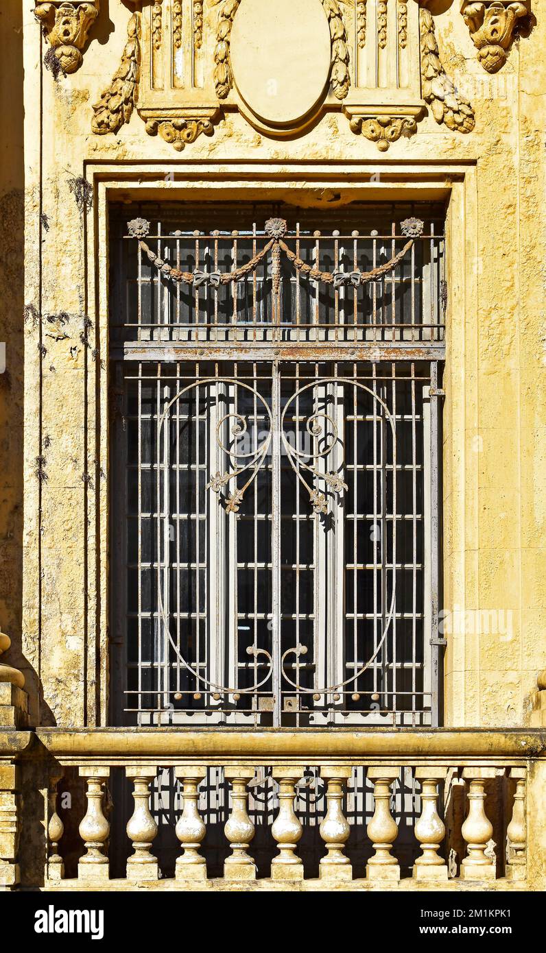 Ancient balcony on yellow facade in Petropolis, Rio de Janeiro, Brazil ...
