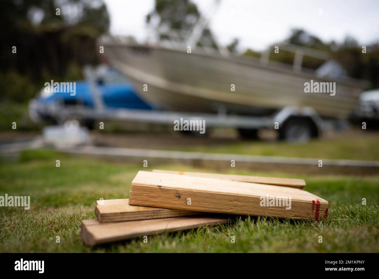 tyre blocks for a trailer in a park for camping Stock Photo - Alamy
