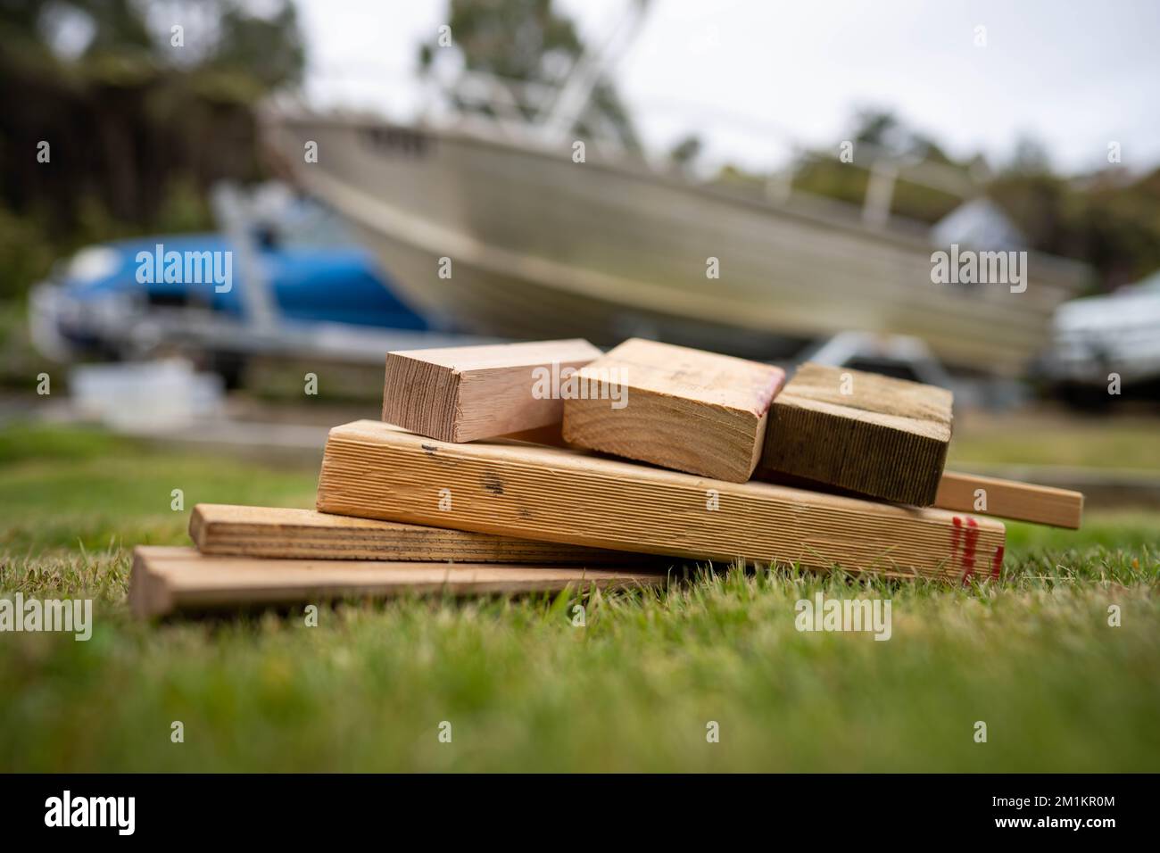 tyre blocks for a trailer in a park for camping Stock Photo - Alamy