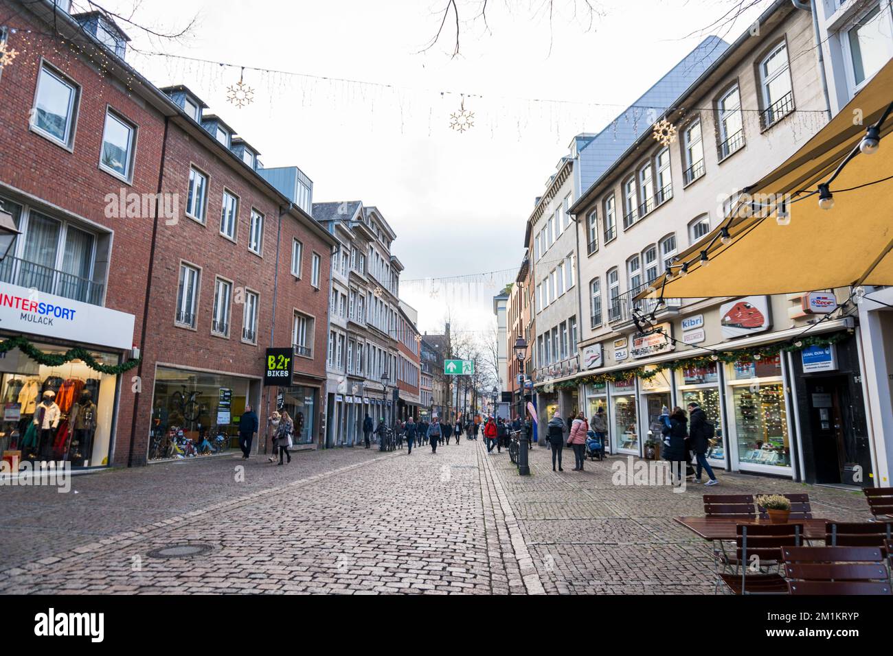 A beautiful busy road with historic buildings in Aachen, Germany Stock ...