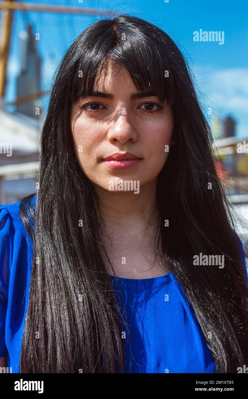 vertical portrait of a latin young caucasian venezuelan woman with ...