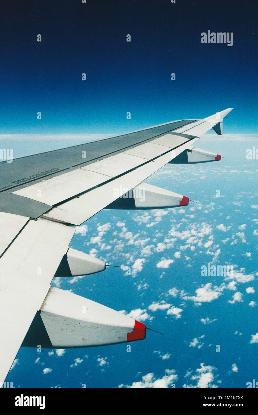airplane wing with clouds Stock Photo - Alamy