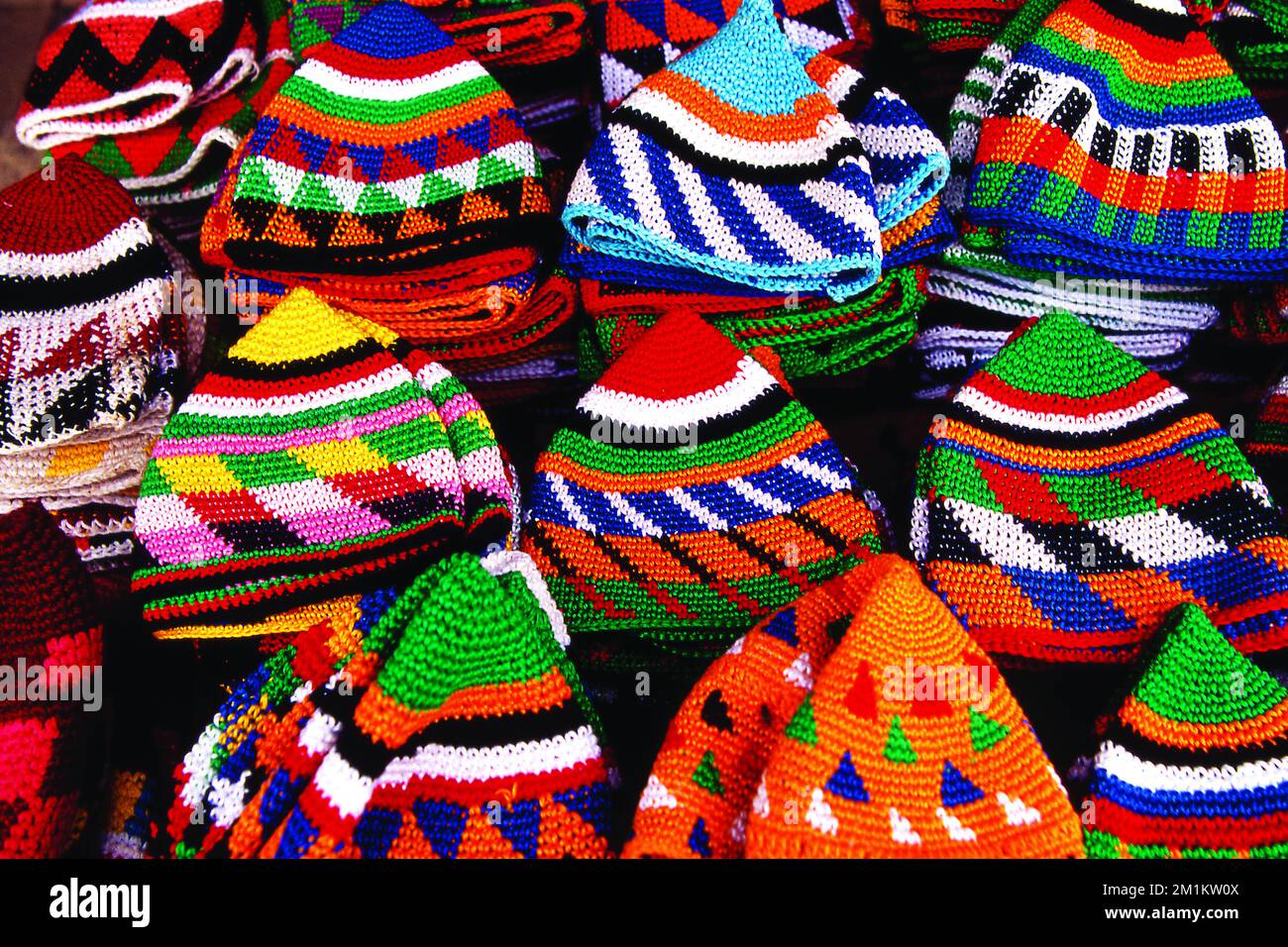 Market stall with colorful winter hats Stock Photo - Alamy