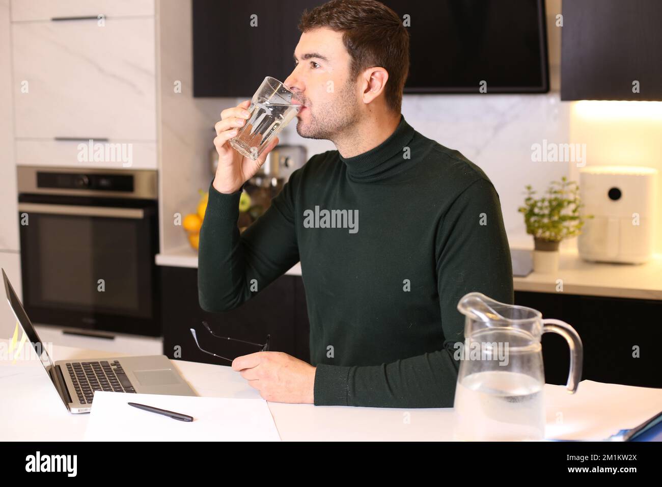 Entrepreneur drinking water from hi-res stock photography and images ...