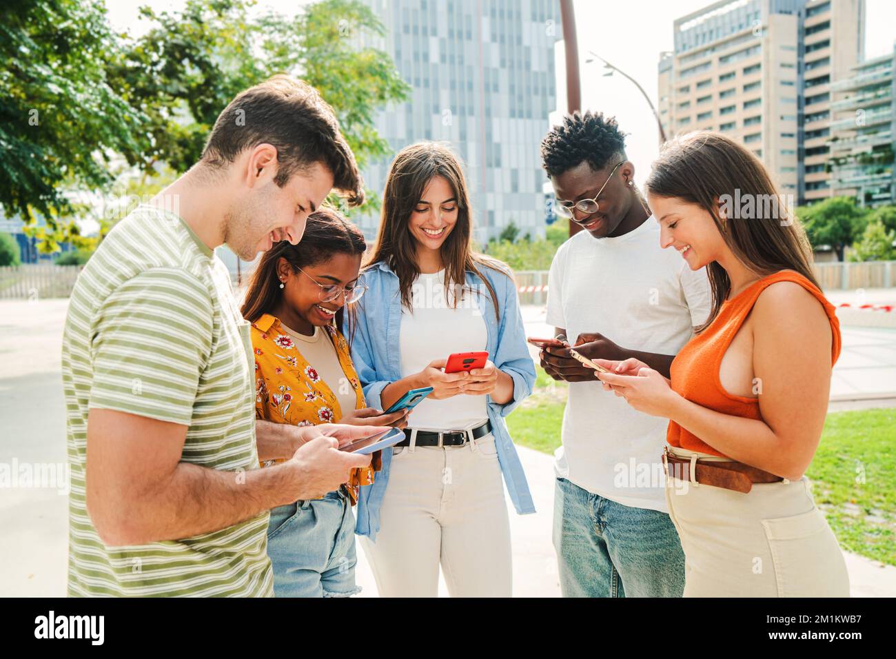 Multiracial group of young smiling students enjoying and having fun ...