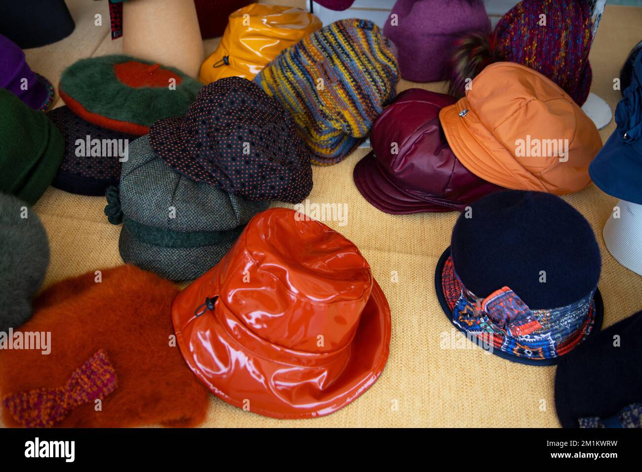 Market stall with colorful winter hats Stock Photo - Alamy