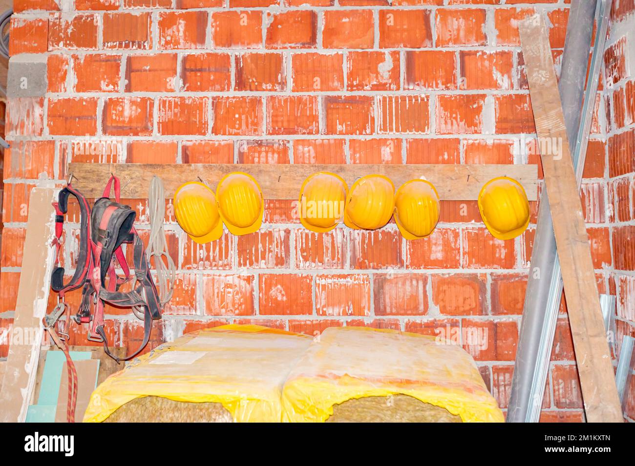 Package of thermal insulation material, rock wool and workers ...