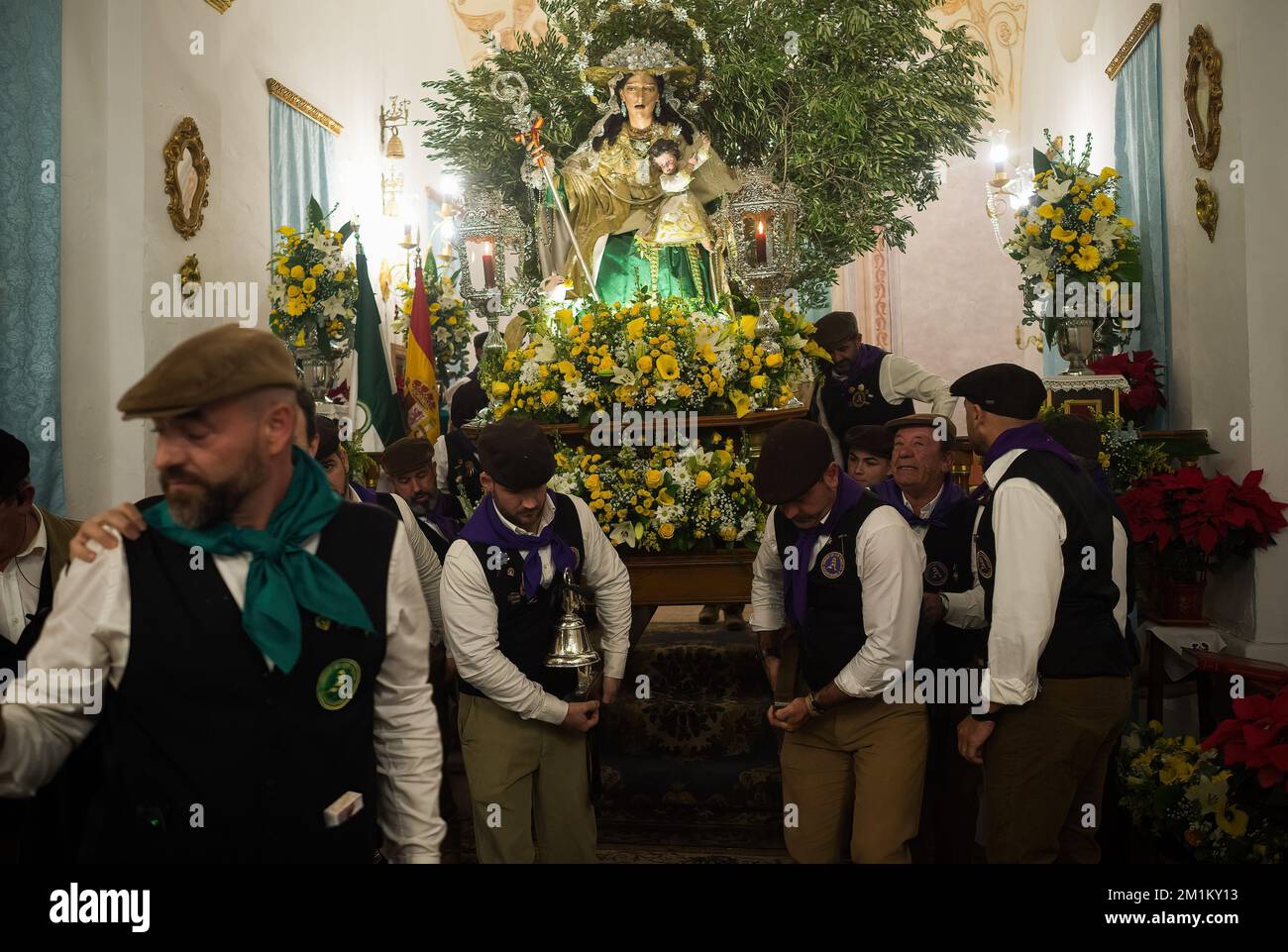 Villagers are seen carrying the virgin inside a hermitage before ...